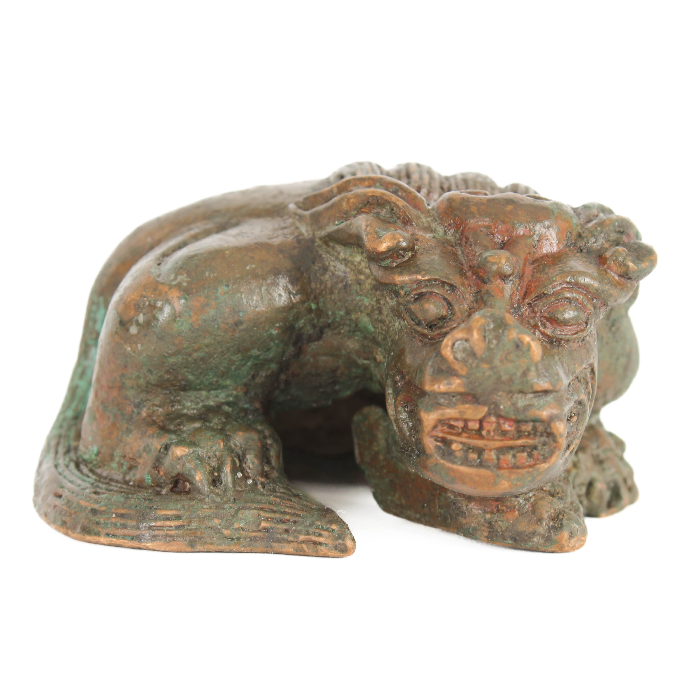 Chinese figure of a reclining tiger. Tang dynasty | Lauritz.com
