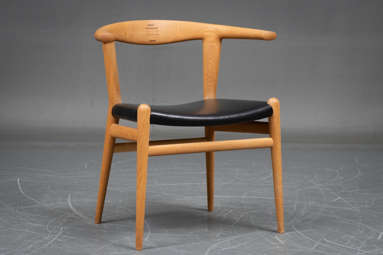 Hans J. Wegner. ‘Bull Chair', lounge chair, Model PP-518, in oak | Barnebys