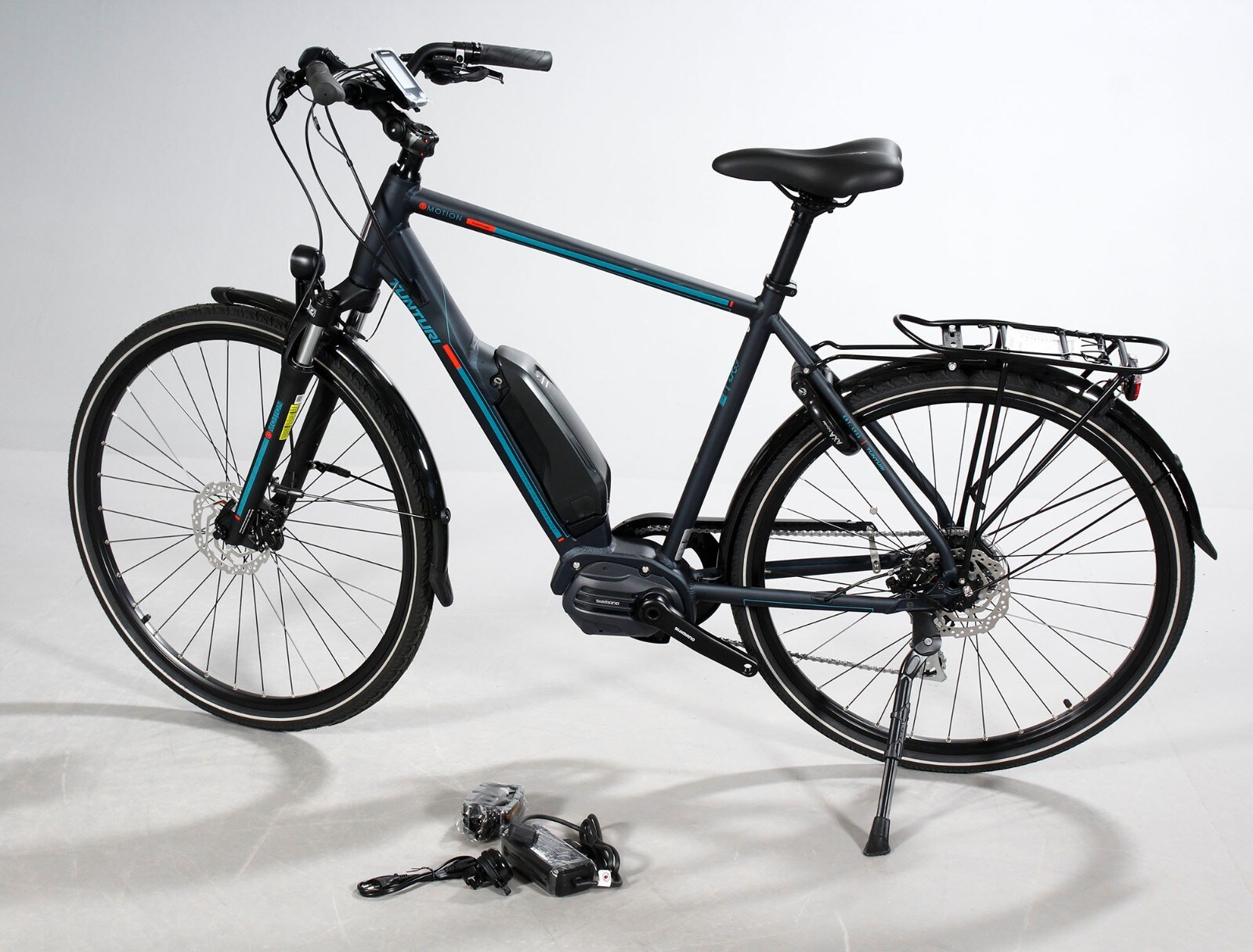 Tunturi Emotion Man City El Cykel, udstillingsmodel | Lauritz.com