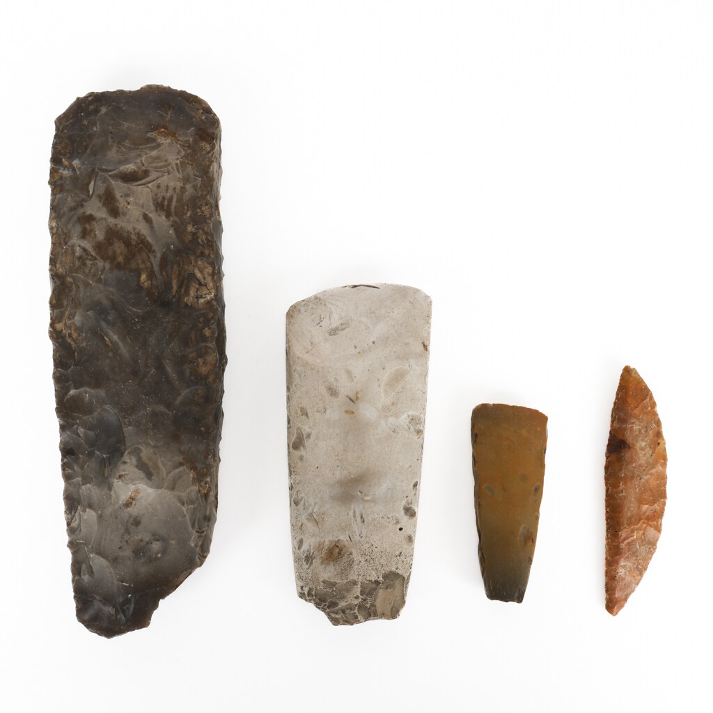 Danish Antiquity: Three stone axes and a flint sickle (4) | Lauritz.com